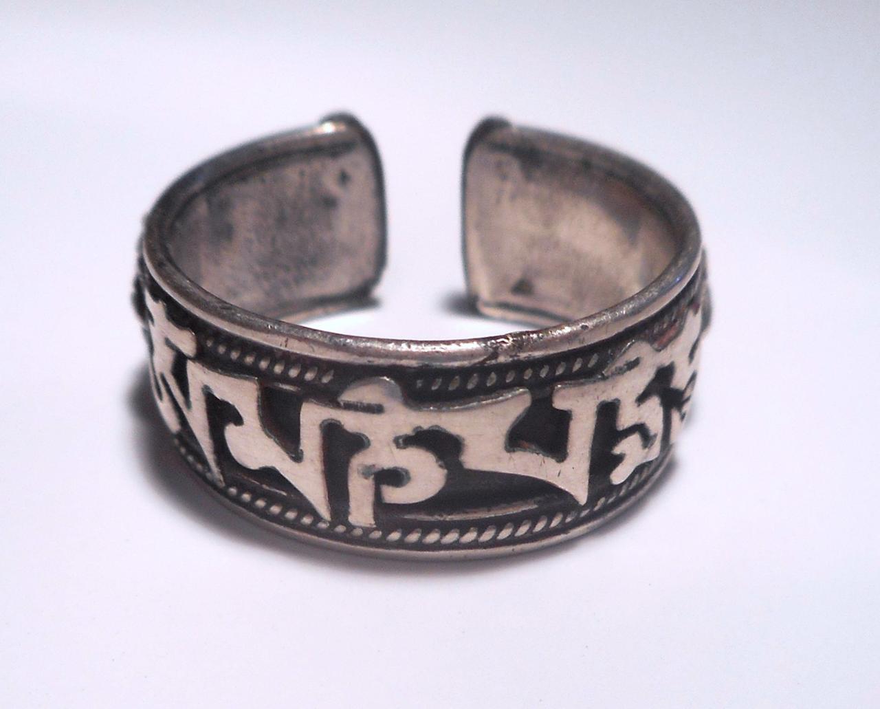 Quentin Wood: Tibetan Mantra Ring in Silver | Powered by Givergy